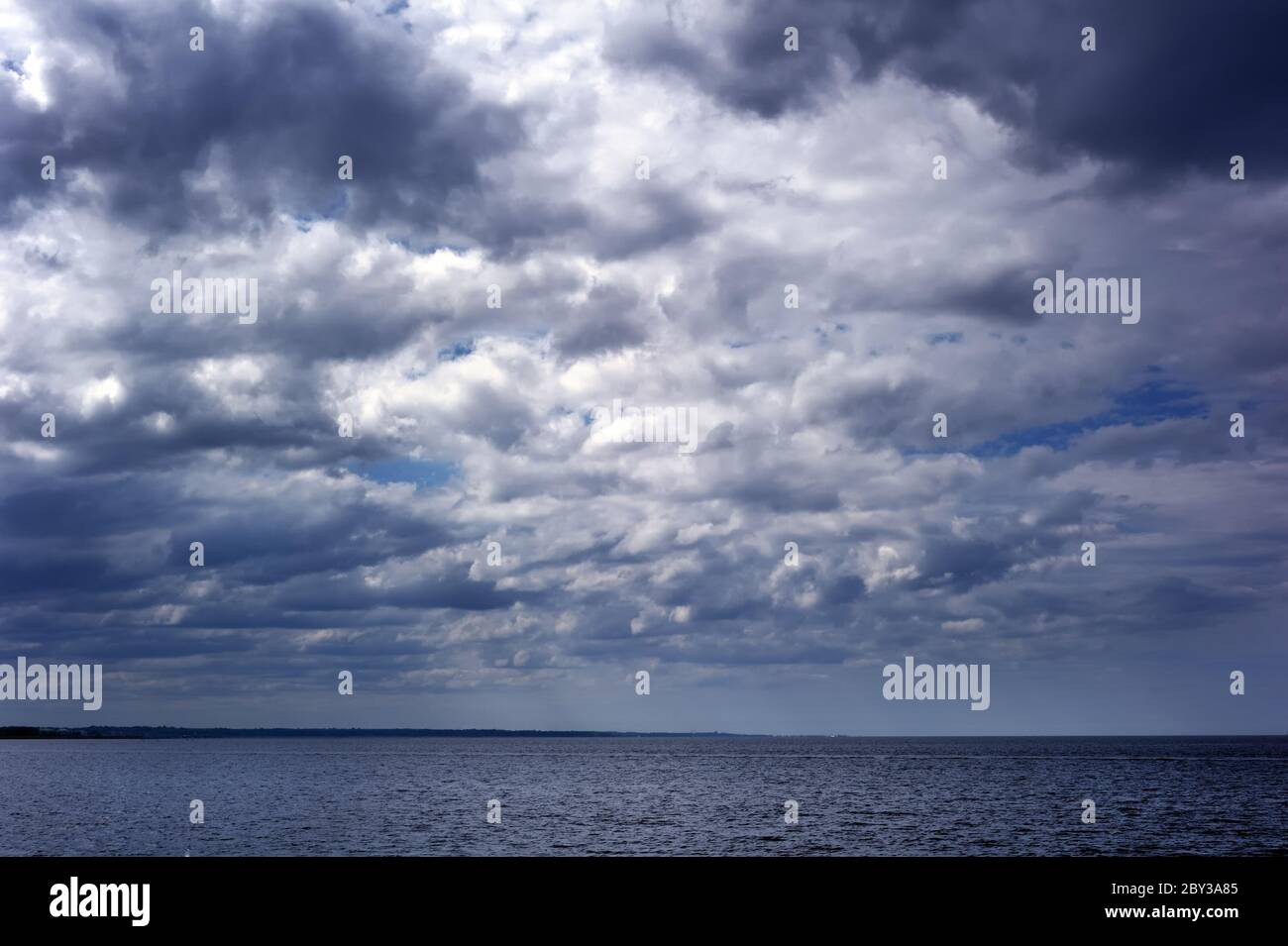 Hurricane storm clouds over ocean waves hi-res stock photography and ...