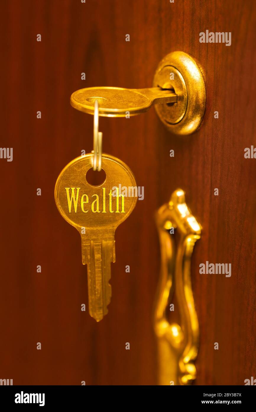 Golden key Wealth Stock Photo - Alamy