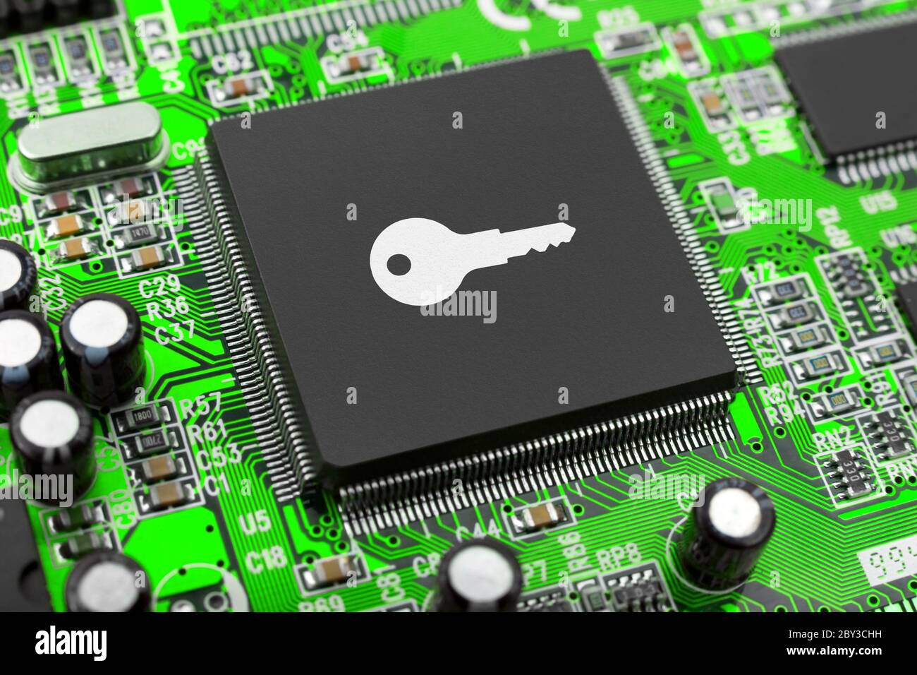 Key on computer chip Stock Photo - Alamy