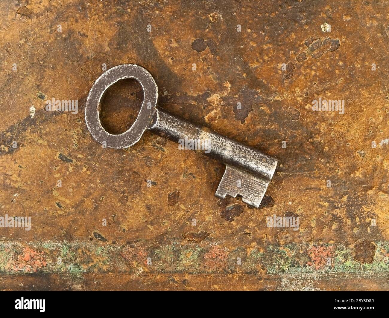 rusty background with key Stock Photo - Alamy