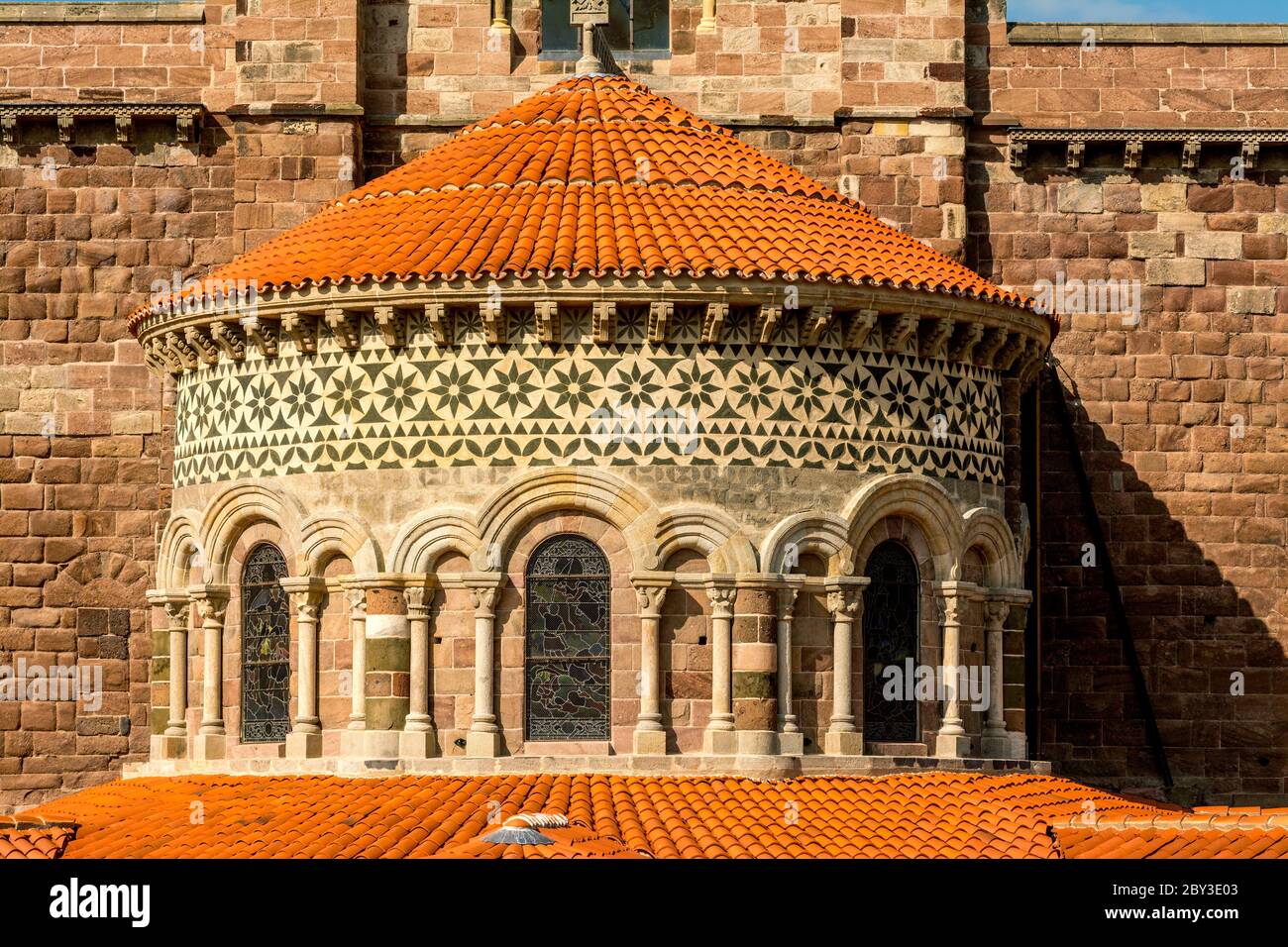 Chevet of Basilica Saint Julien. Romanesque church in Haute Loire ...