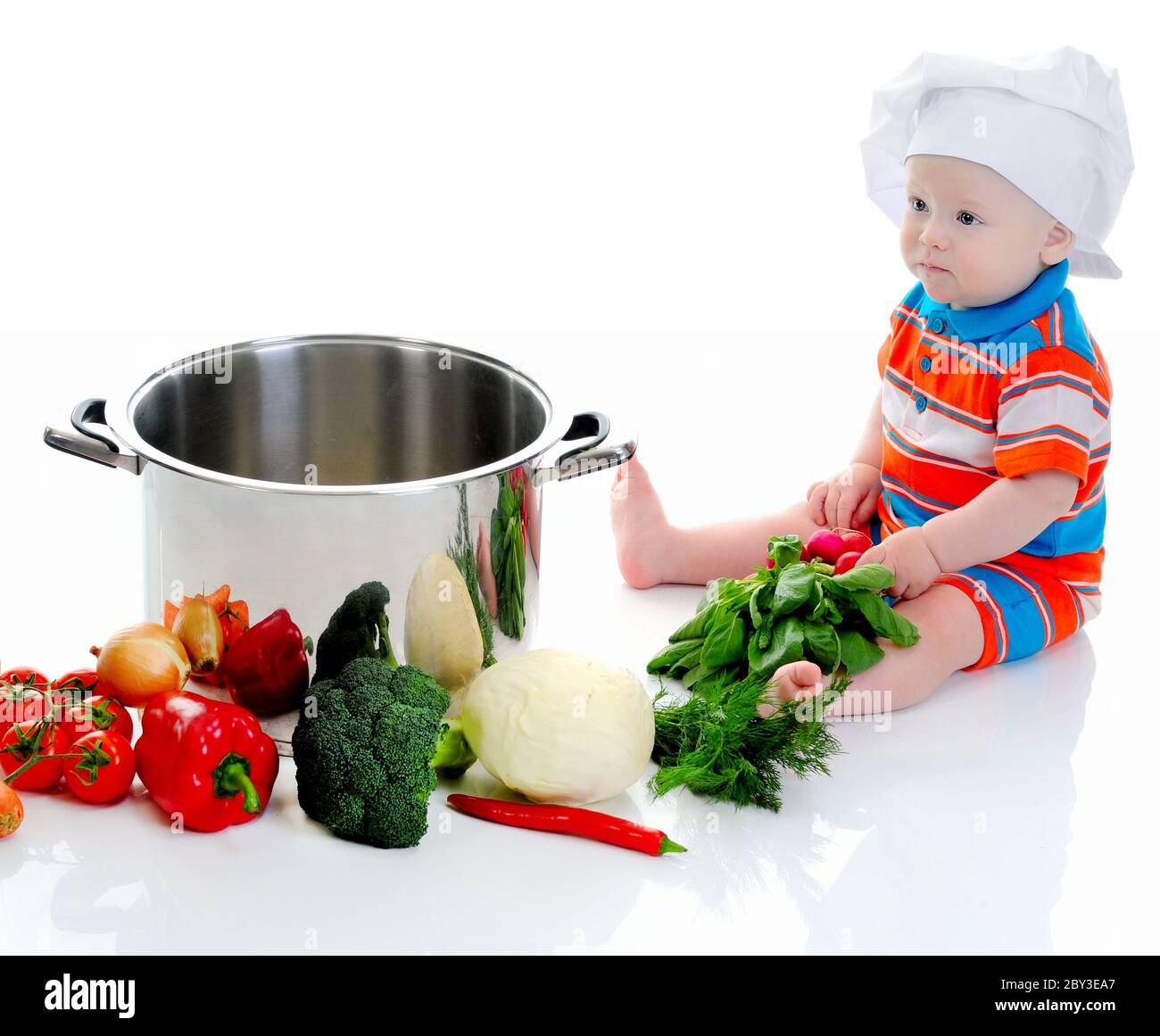 Boy with a pan Stock Photo - Alamy