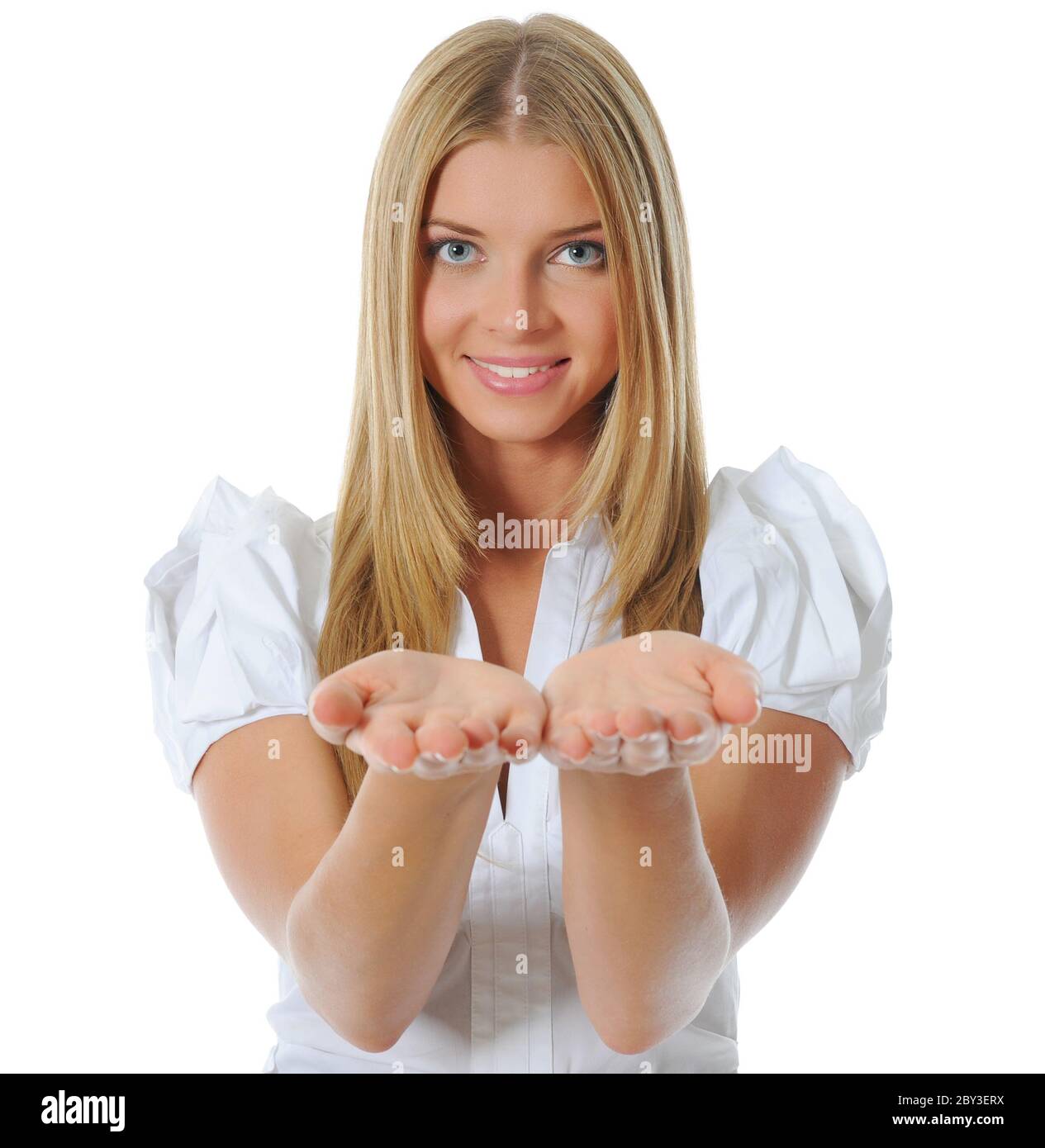 woman looks at her open palm Stock Photo - Alamy