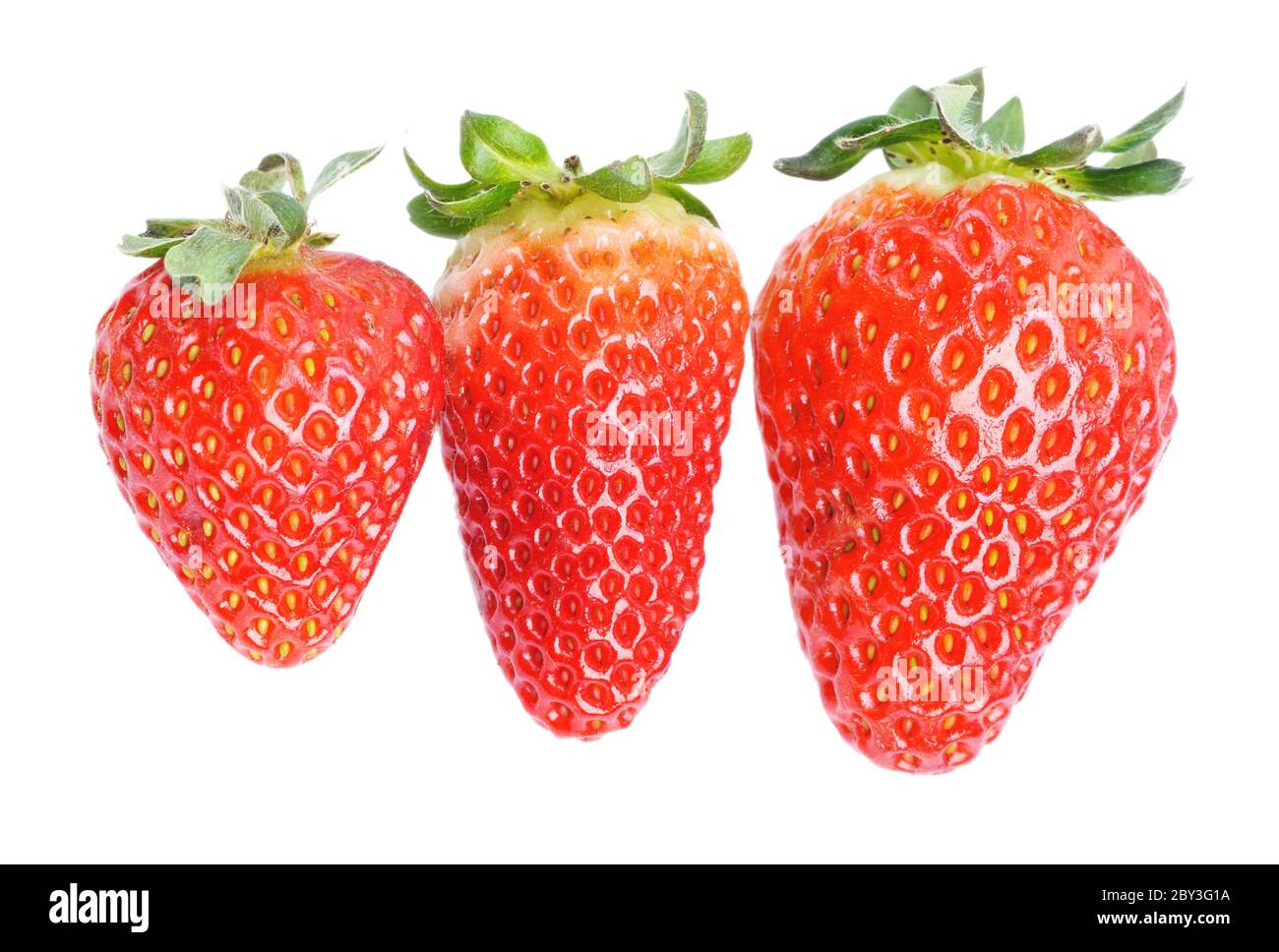 Strawberries isolated on white Stock Photo - Alamy