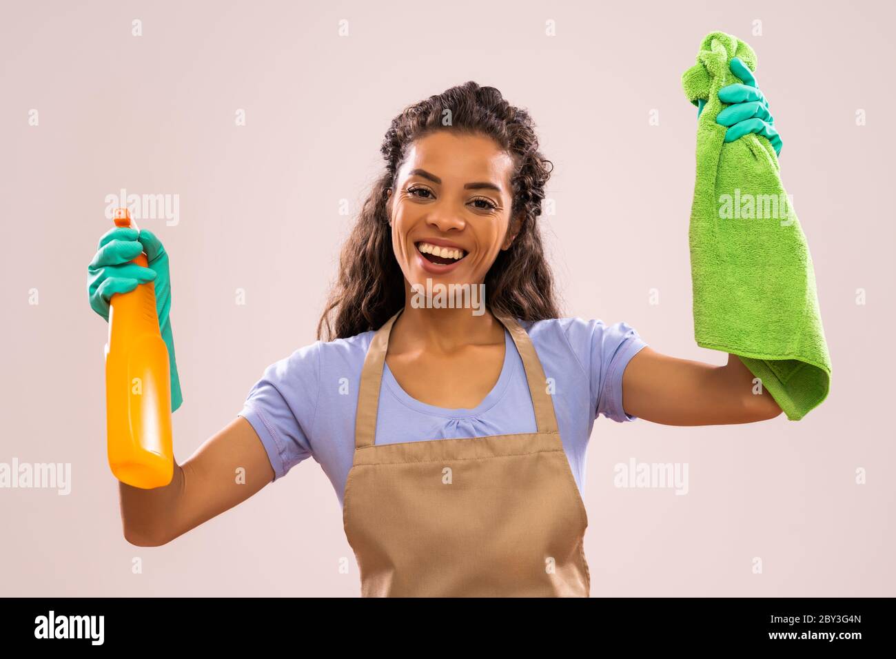 Portrait of happy and successful african-american housewife who is ...