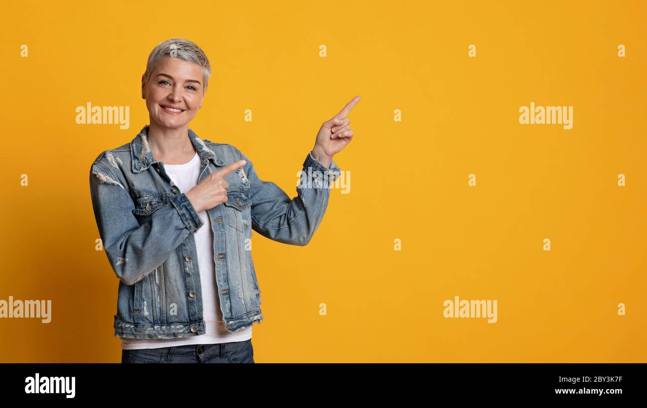 Aged woman pointing finger copy hi-res stock photography and images - Alamy