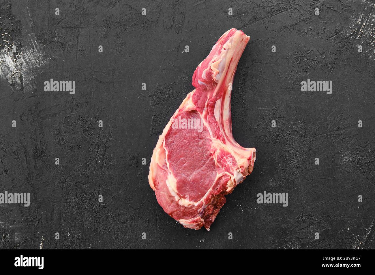 Top view of beef ribeye steak bone-in Stock Photo - Alamy