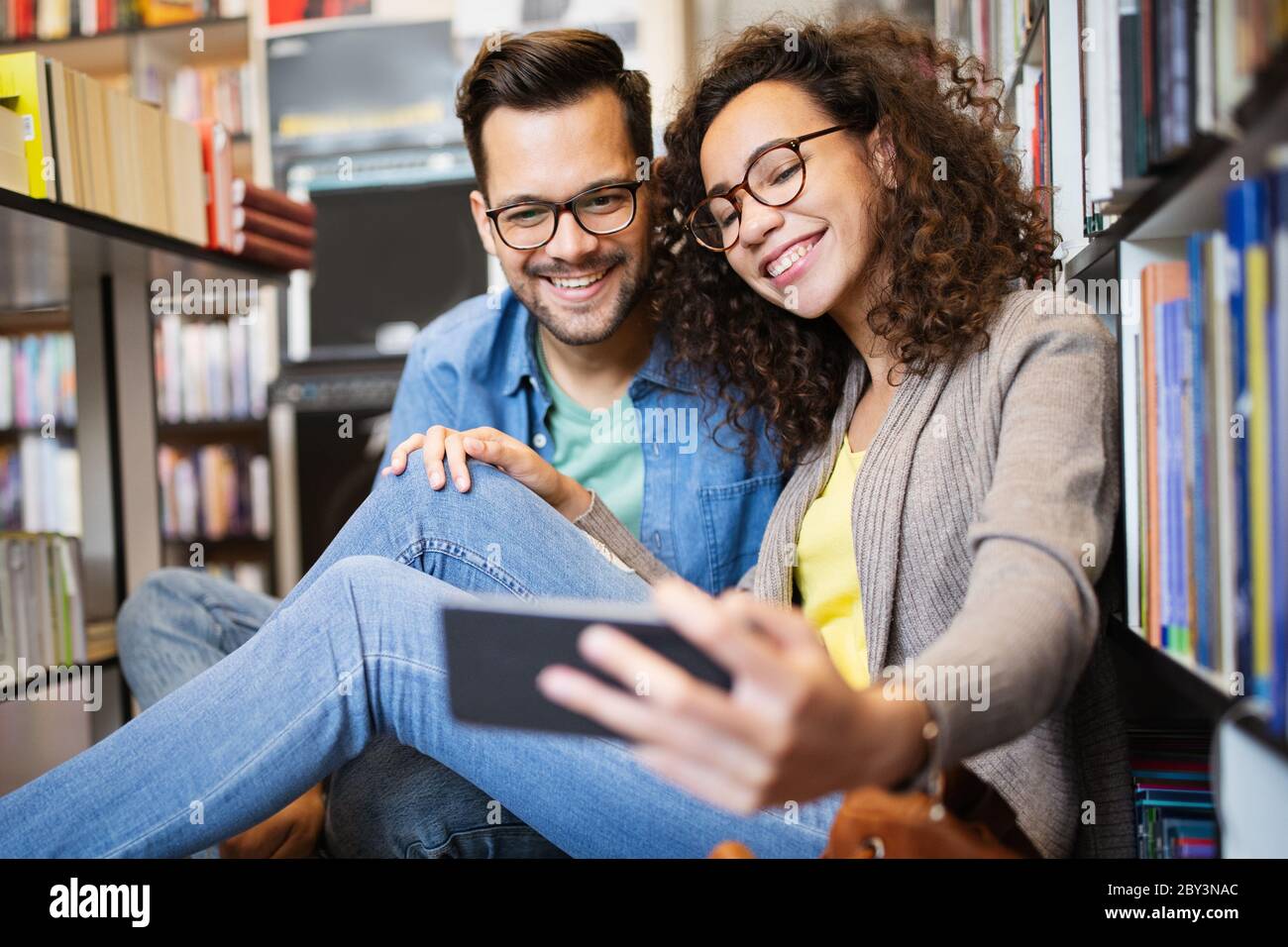 Student studying brainstorming library friends teamwork concept Stock ...