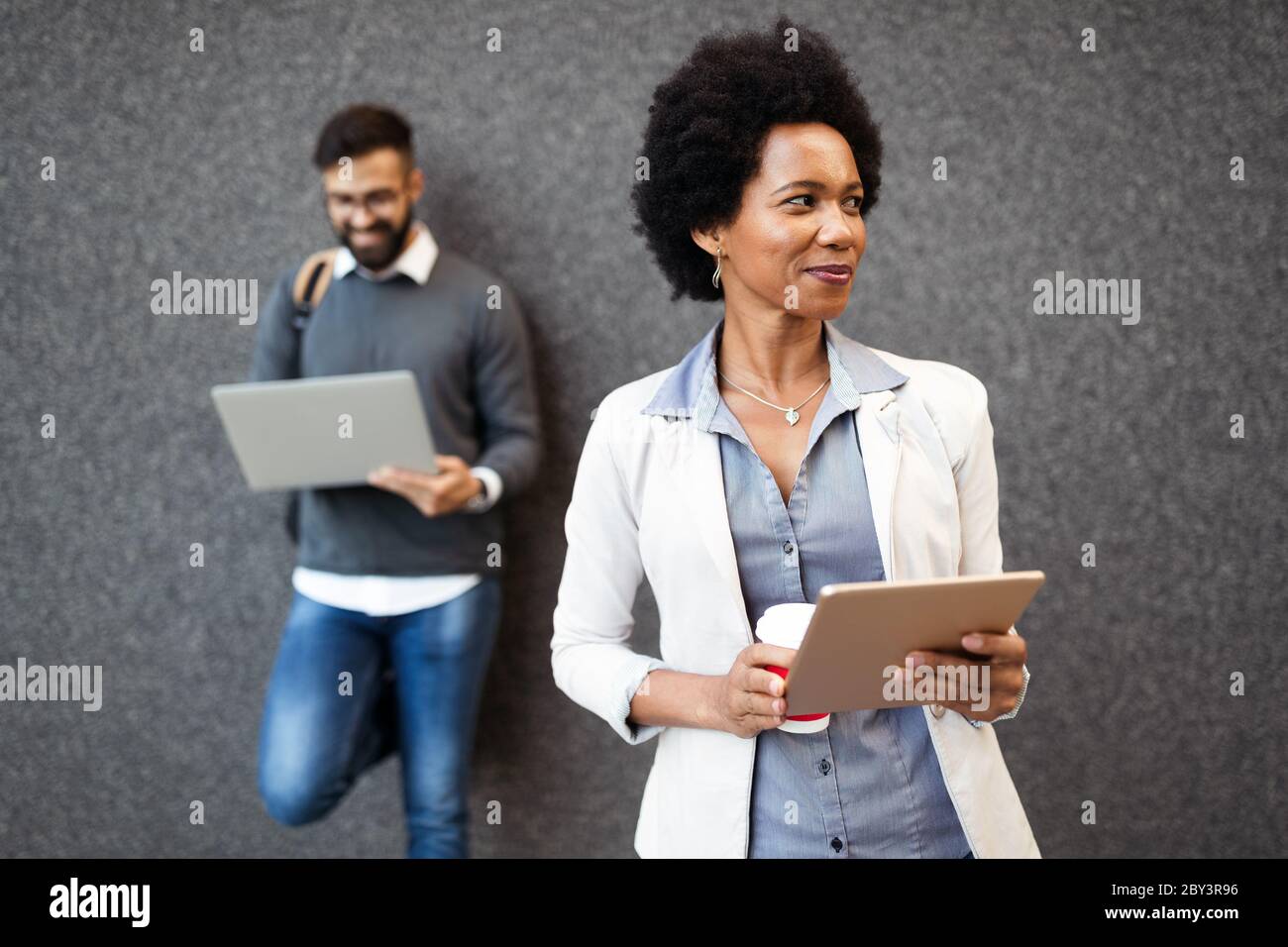 Happy busy people using technology devices outdoor in city Stock Photo ...
