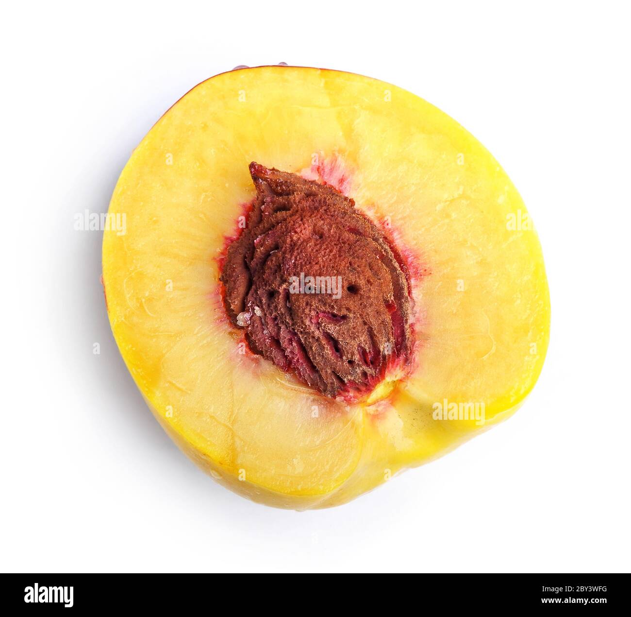 Half of peach isolated on white Stock Photo - Alamy