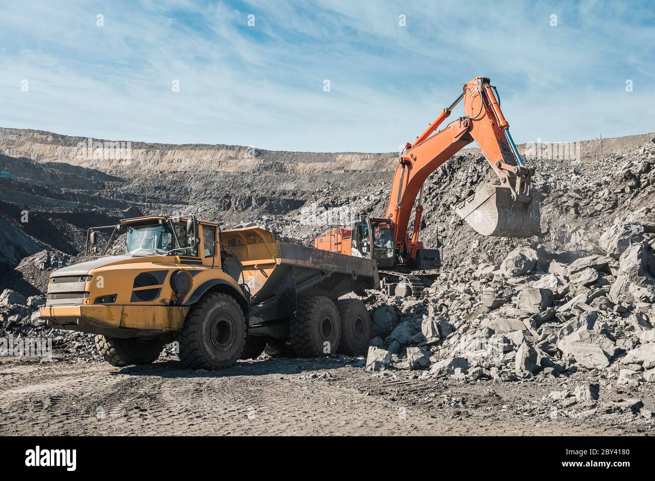 Giant huge quarry trucks mining hi-res stock photography and images - Alamy