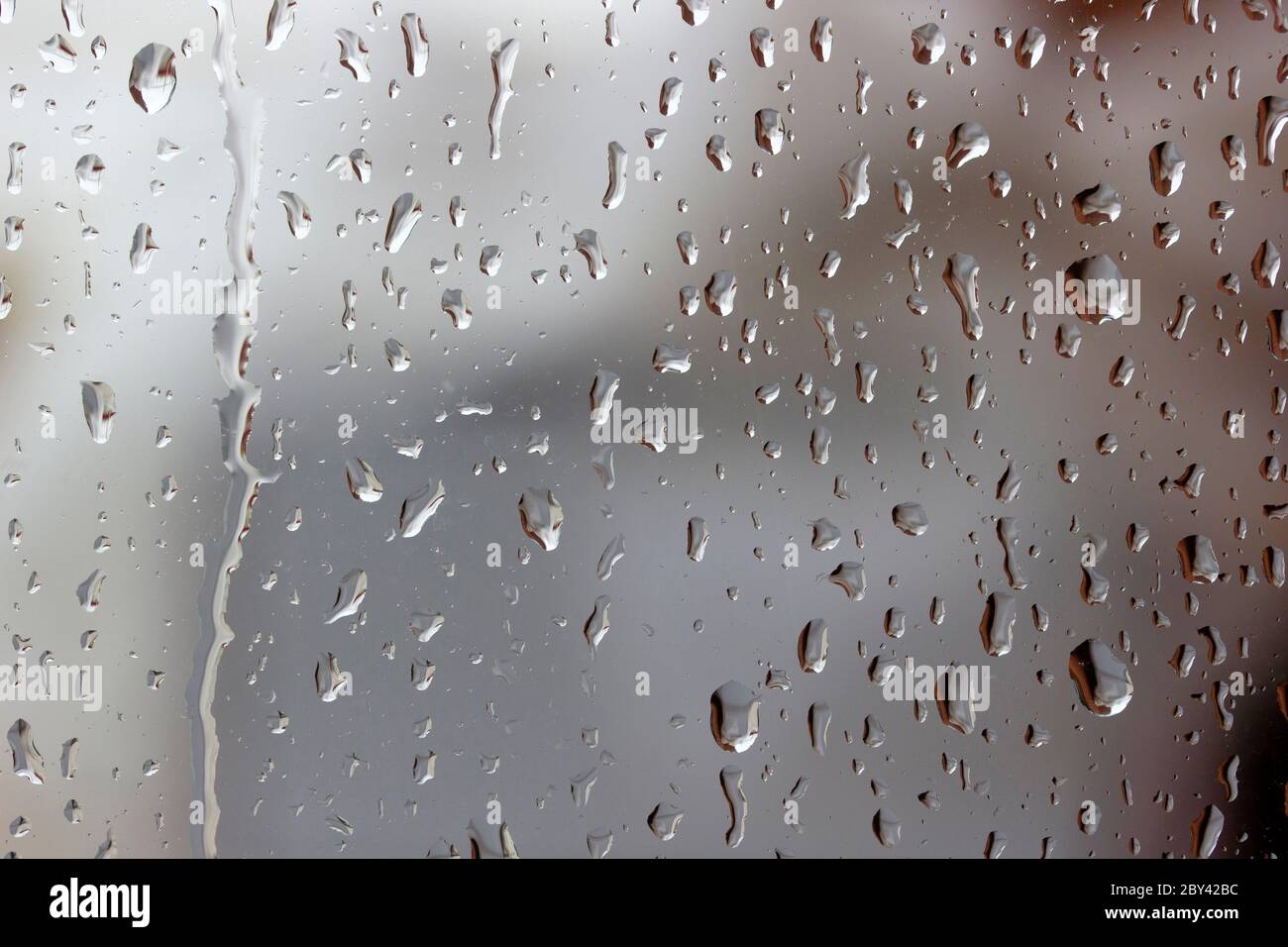 raindrops on glass texture abstract background Stock Photo - Alamy