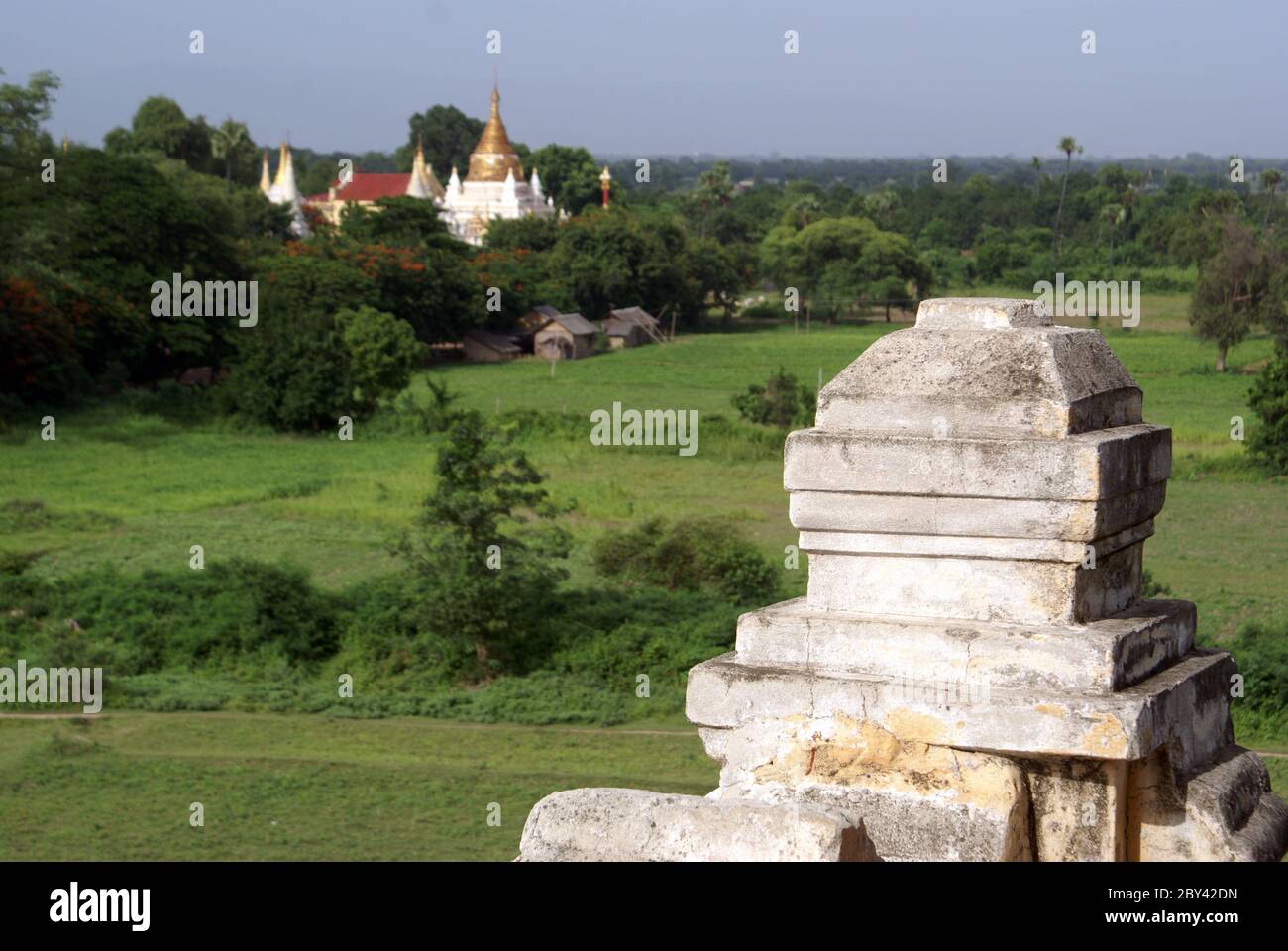 Stone, field and monastery Stock Photo - Alamy