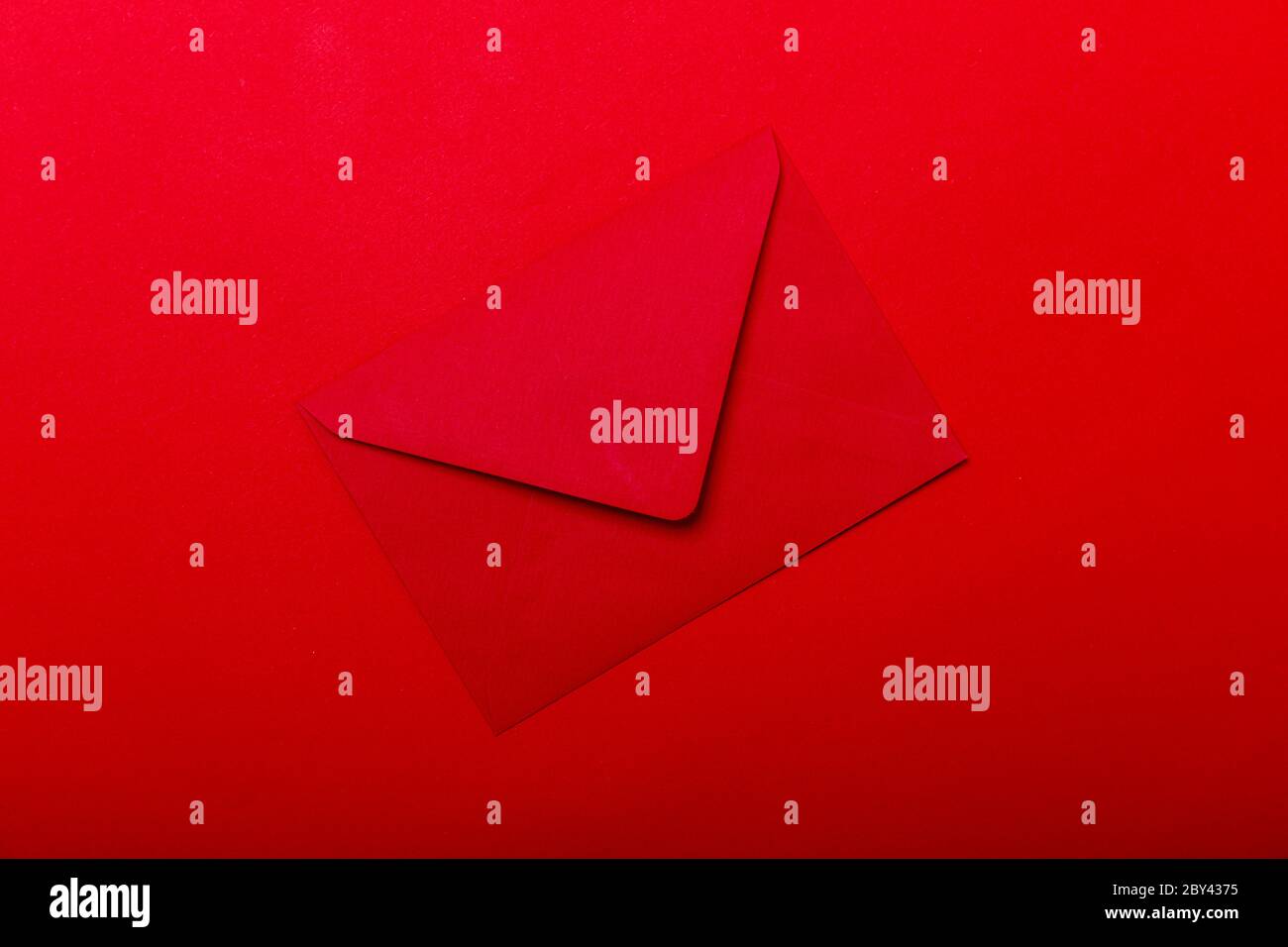Opened red envelope. Blank envelope on dark red background Stock Photo ...