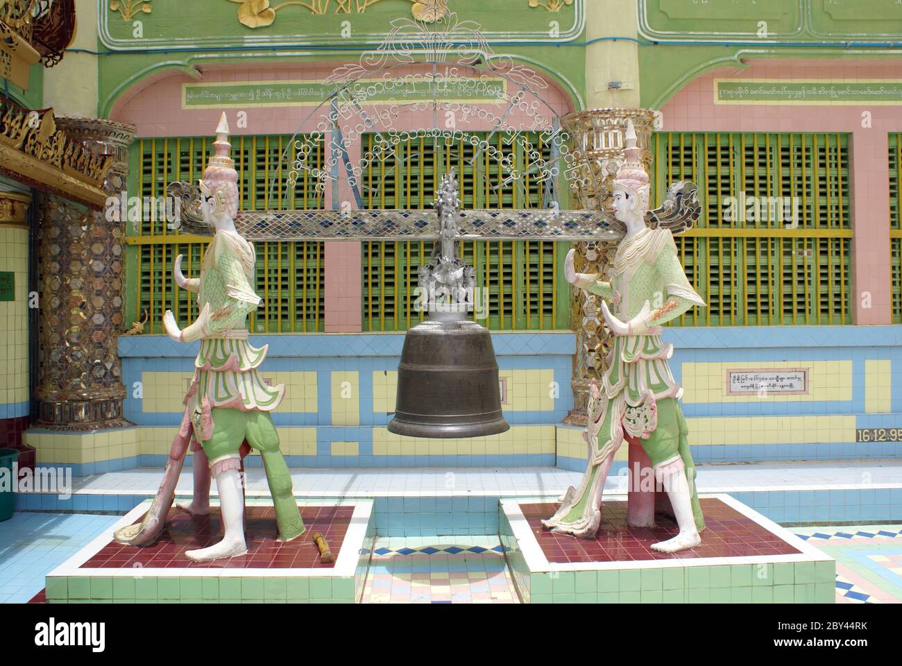 Statues and bell Stock Photo - Alamy