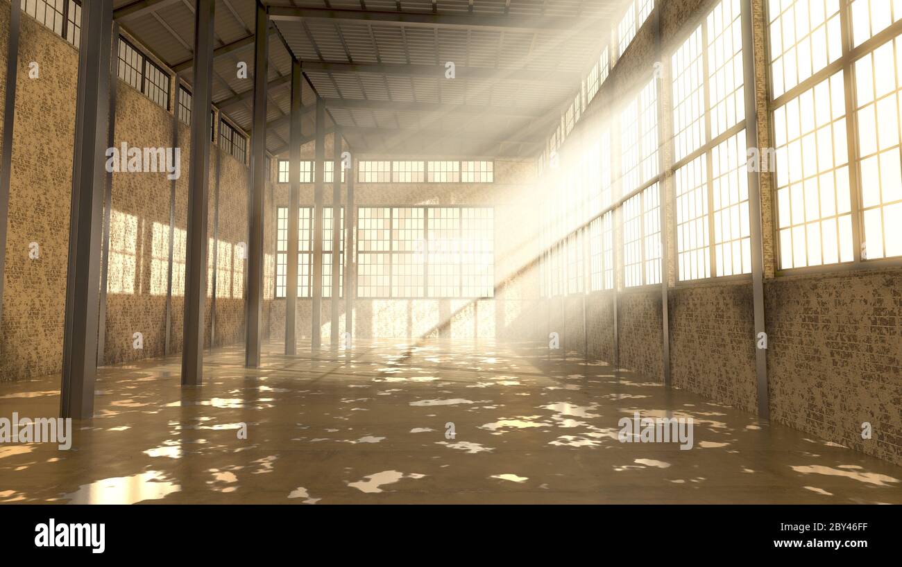An empty and abandoned factory interior in the daytime with bright ...