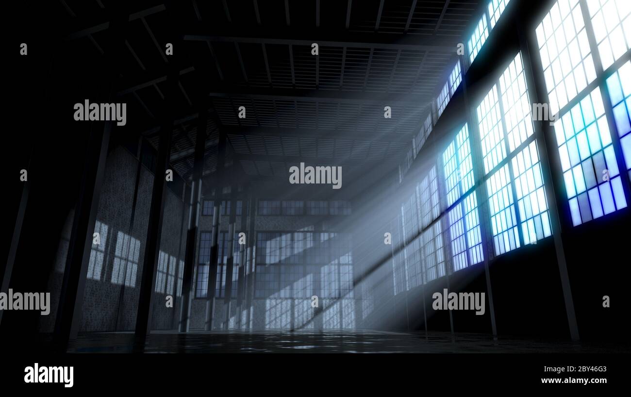 An empty and abandoned factory interior in the nighttime with bright ...