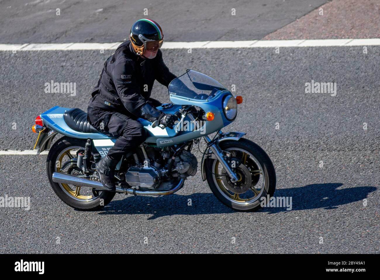Ducati Desmo Motorbike rider; two wheeled transport, motorcycles ...
