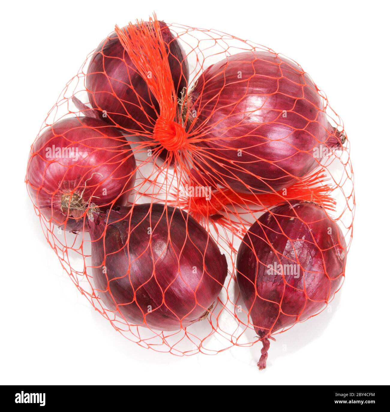 Red onion in packing from red net Stock Photo - Alamy