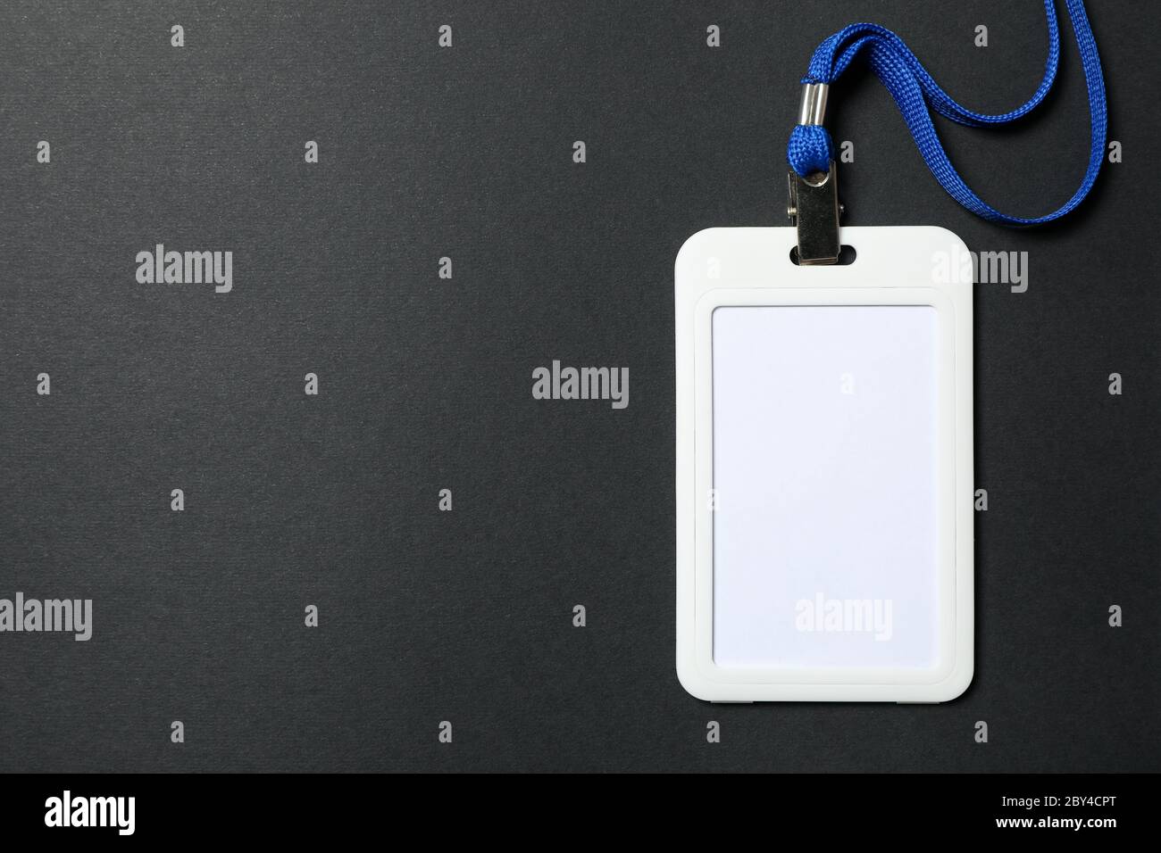 Empty name tag on black background, space for text Stock Photo - Alamy