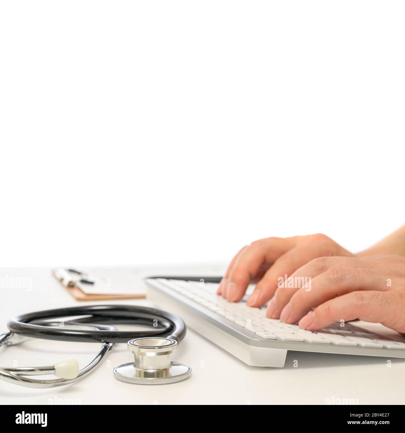 Hands of a male doctor who uses a computer keyboard Stock Photo - Alamy