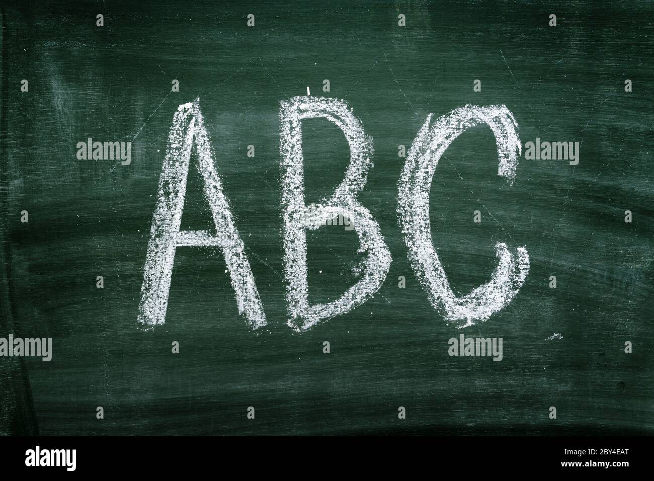 ABC letters on green chalkboard, for schooling and primary education ...