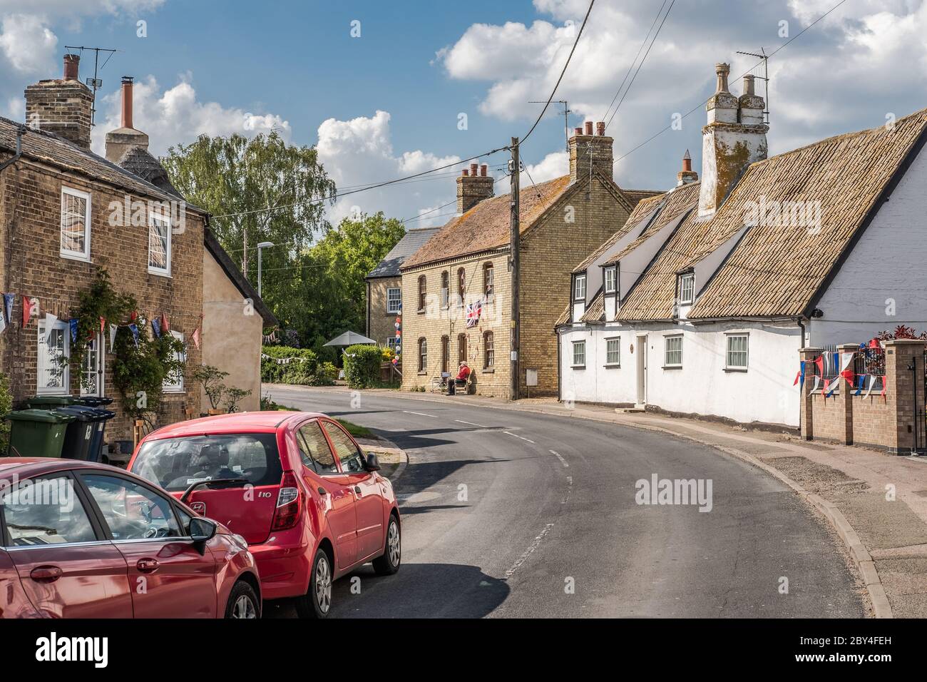 Typical English rural street showing old cottages and terraced houses ...