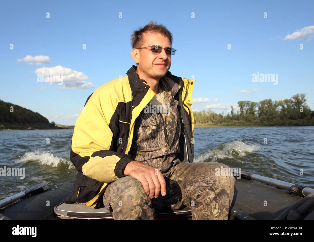 Man on rubber speedboat hi-res stock photography and images - Alamy