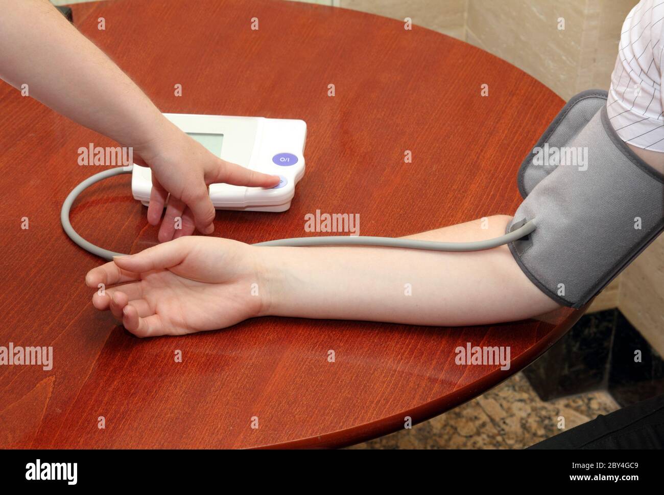 blood pressure measurement Stock Photo - Alamy