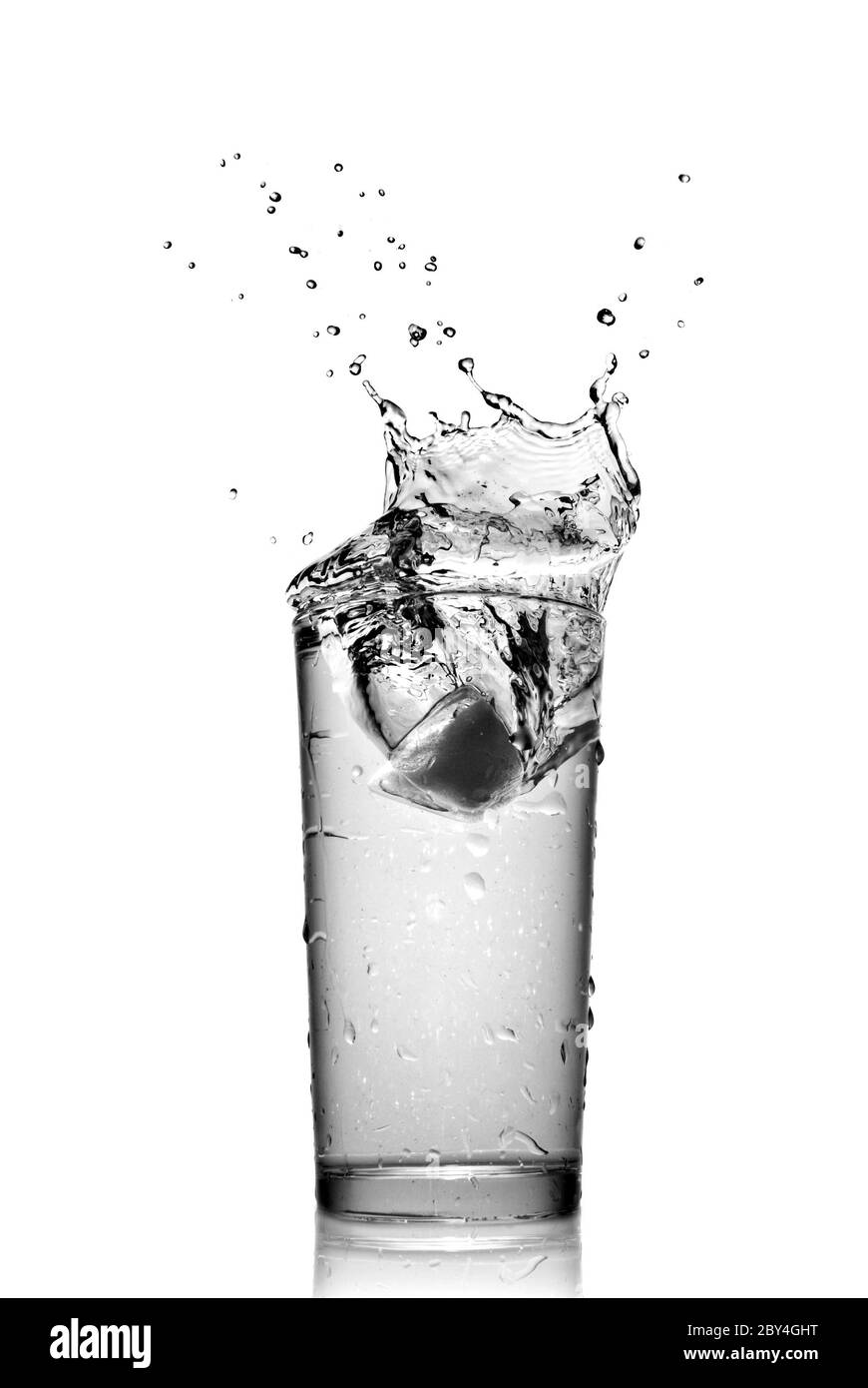 water splash in glass isolated on white Stock Photo - Alamy