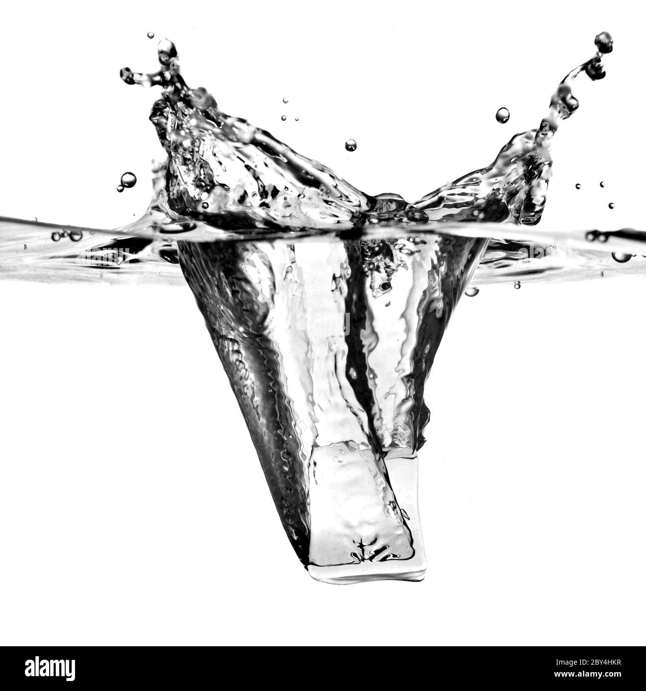 ice cube dropped into water with splash isolated on white Stock Photo ...