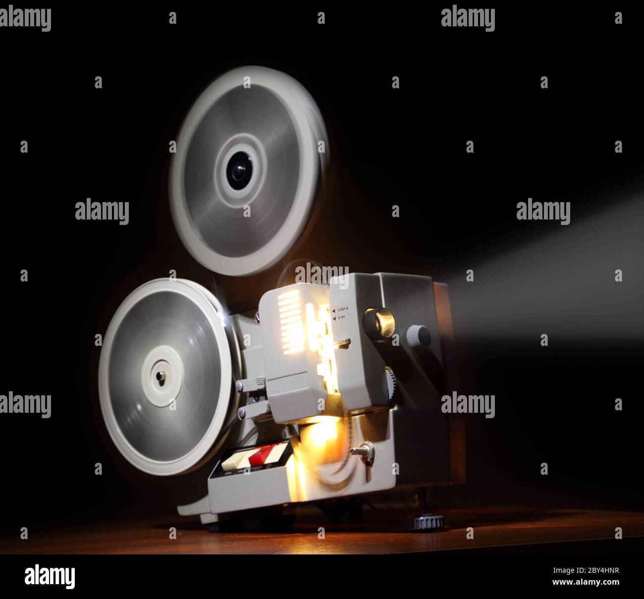 Old movie projector showing film hi-res stock photography and images ...