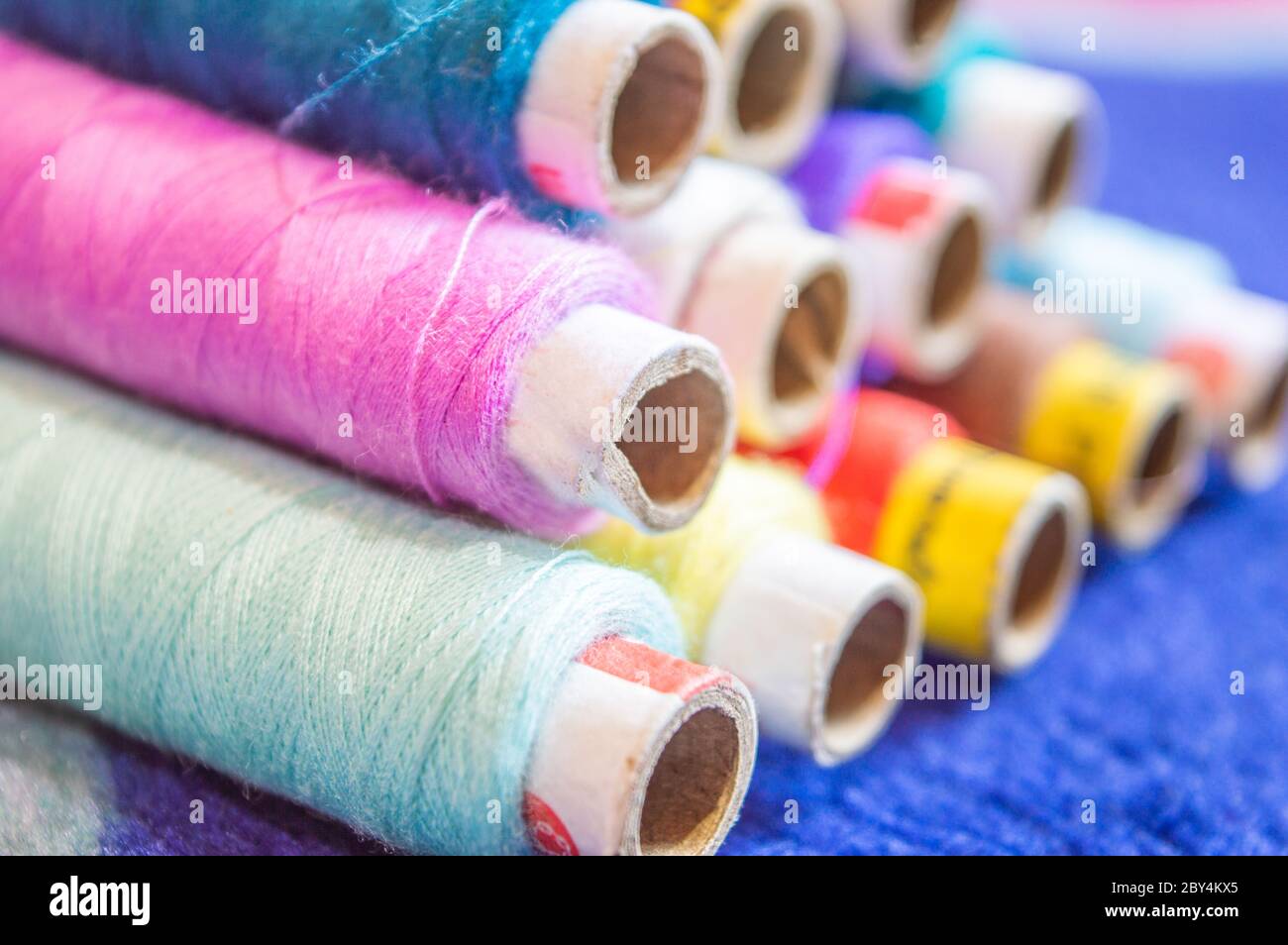 Coloured thread background hi-res stock photography and images - Alamy