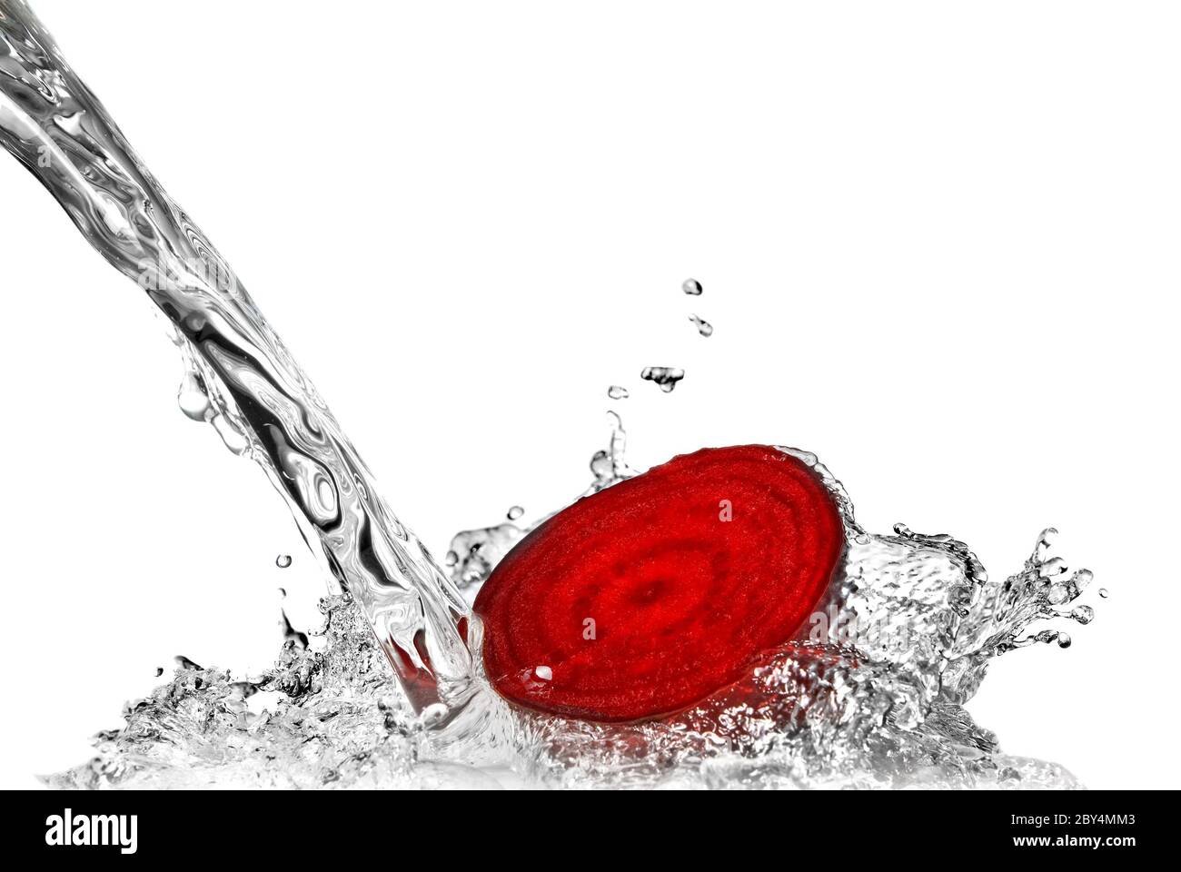 red beet with water splash isolated on white Stock Photo - Alamy