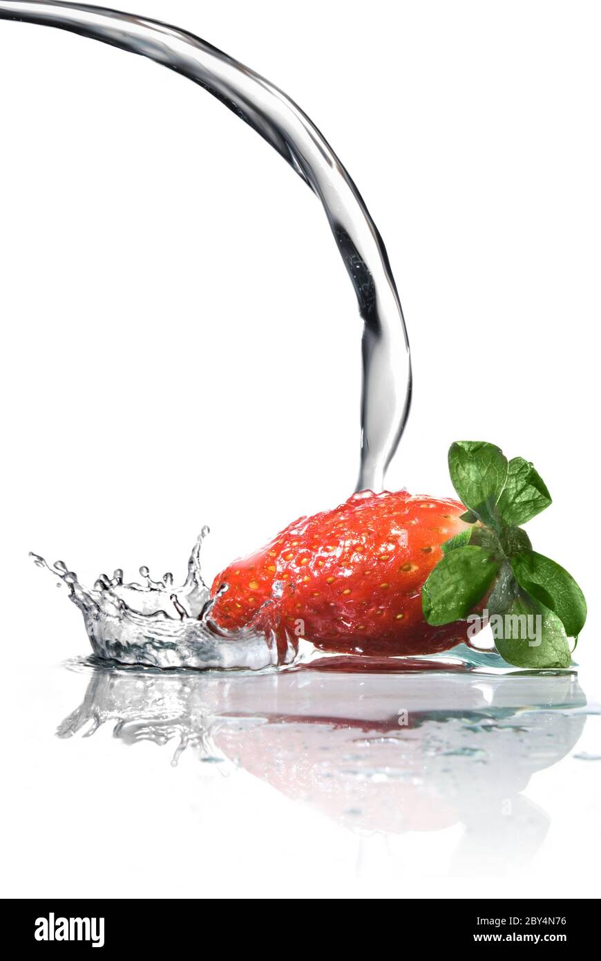 Fresh strawberry and water splash isolated on white Stock Photo - Alamy
