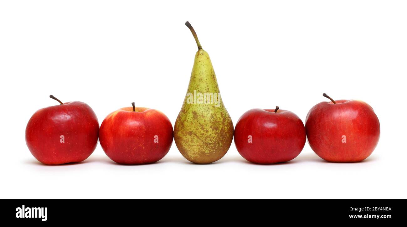 different - pear between green apples Stock Photo - Alamy