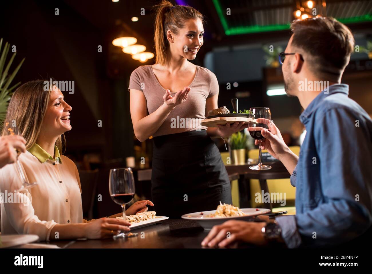 Waiter Serving Food Restaurant High Resolution Stock Photography and ...