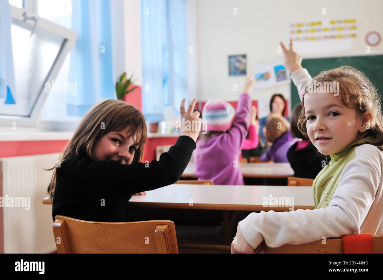 happy teacher in school classroom Stock Photo - Alamy