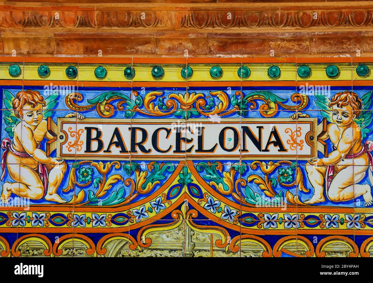 Barcelona sign over a mosaic wall Stock Photo - Alamy
