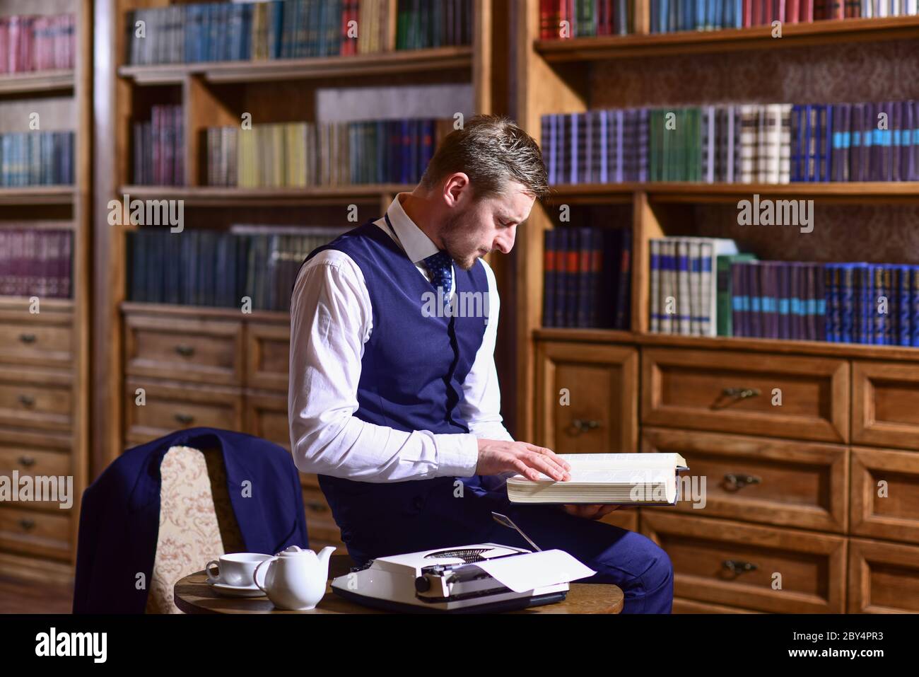 Intelligent elite and scientific people concept. Man in suit with ...