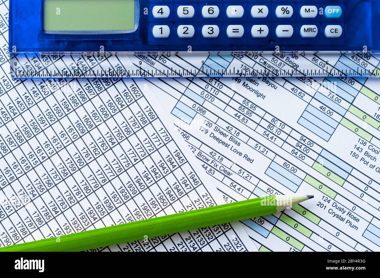 Calculator, pencil and data sheet Stock Photo - Alamy