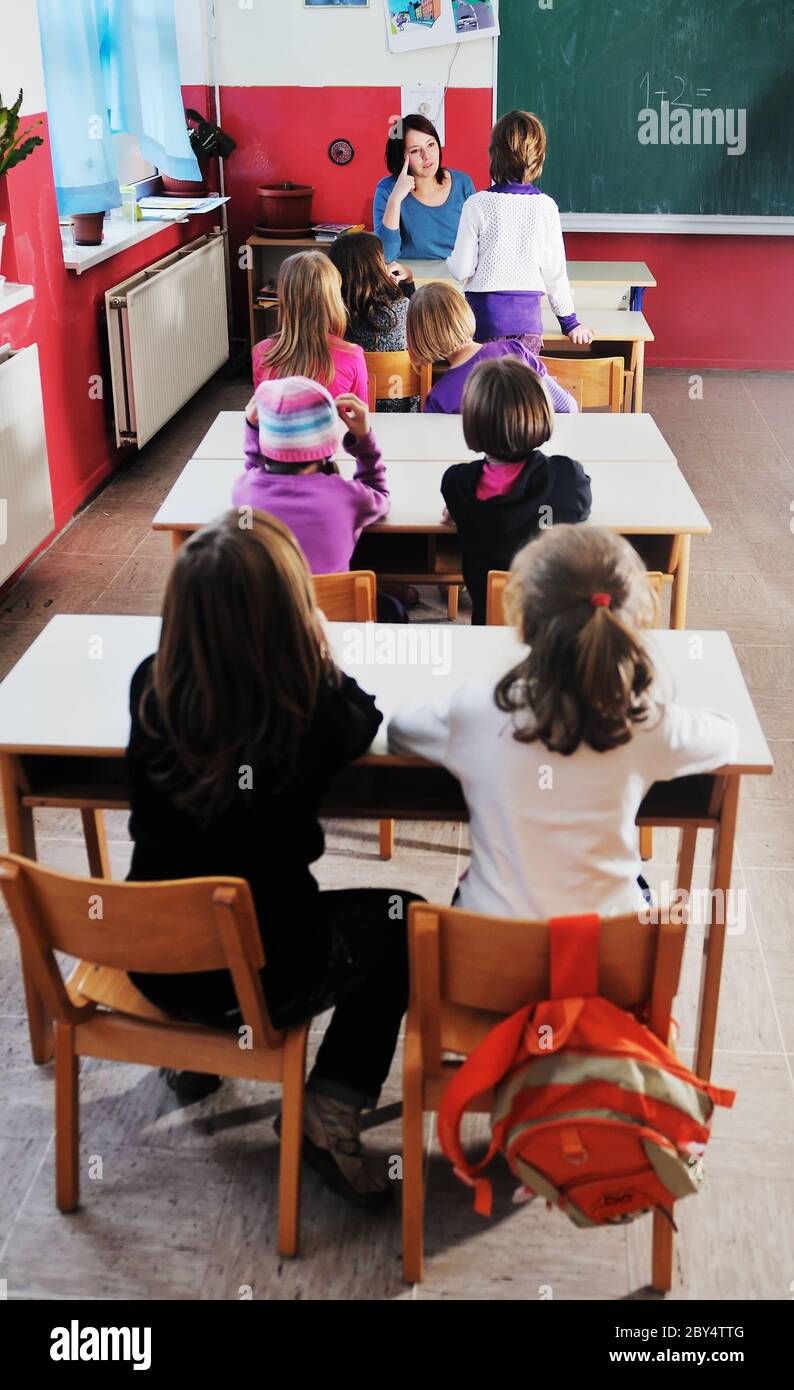happy teacher in school classroom Stock Photo - Alamy