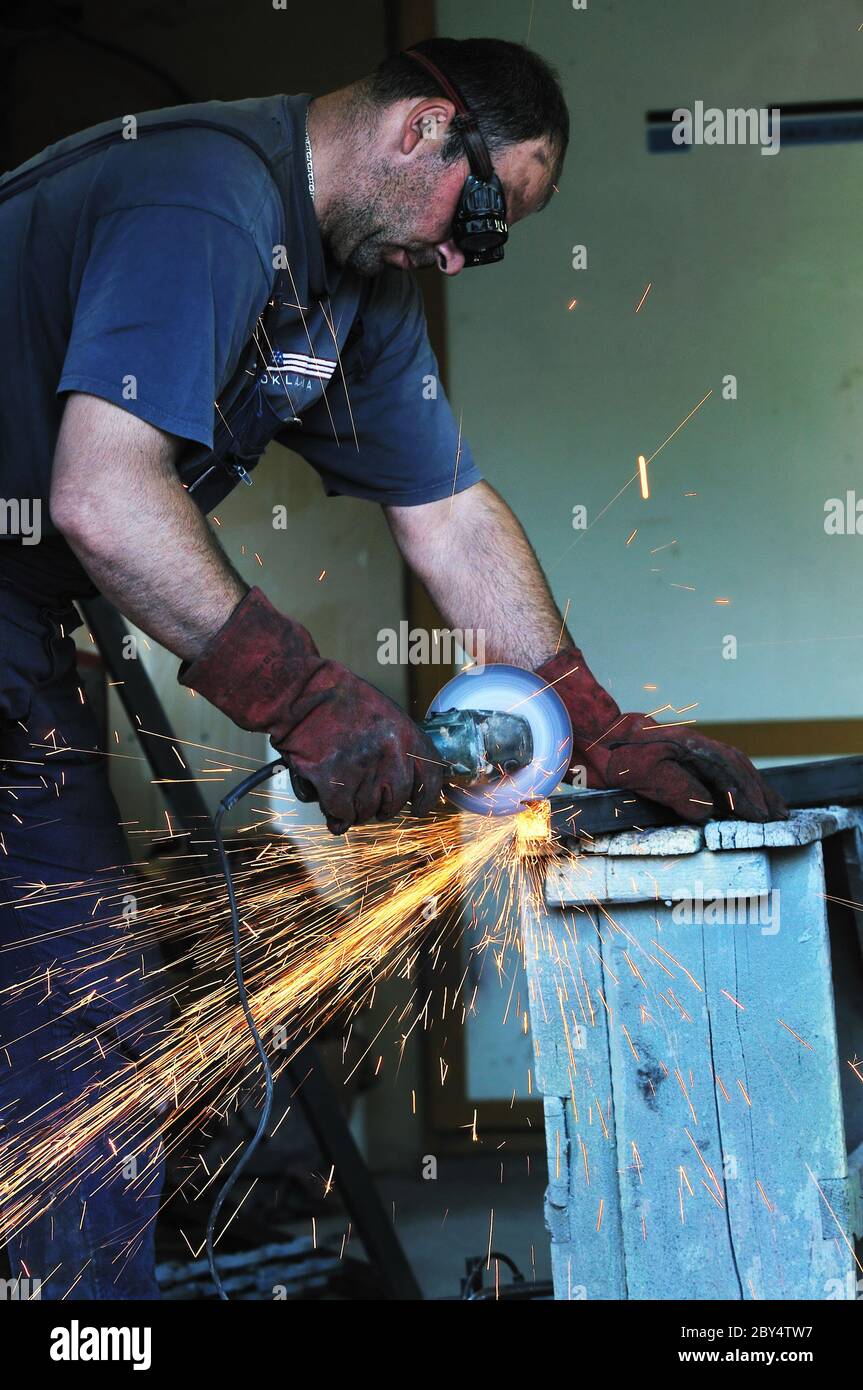 industry worker sparks Stock Photo - Alamy