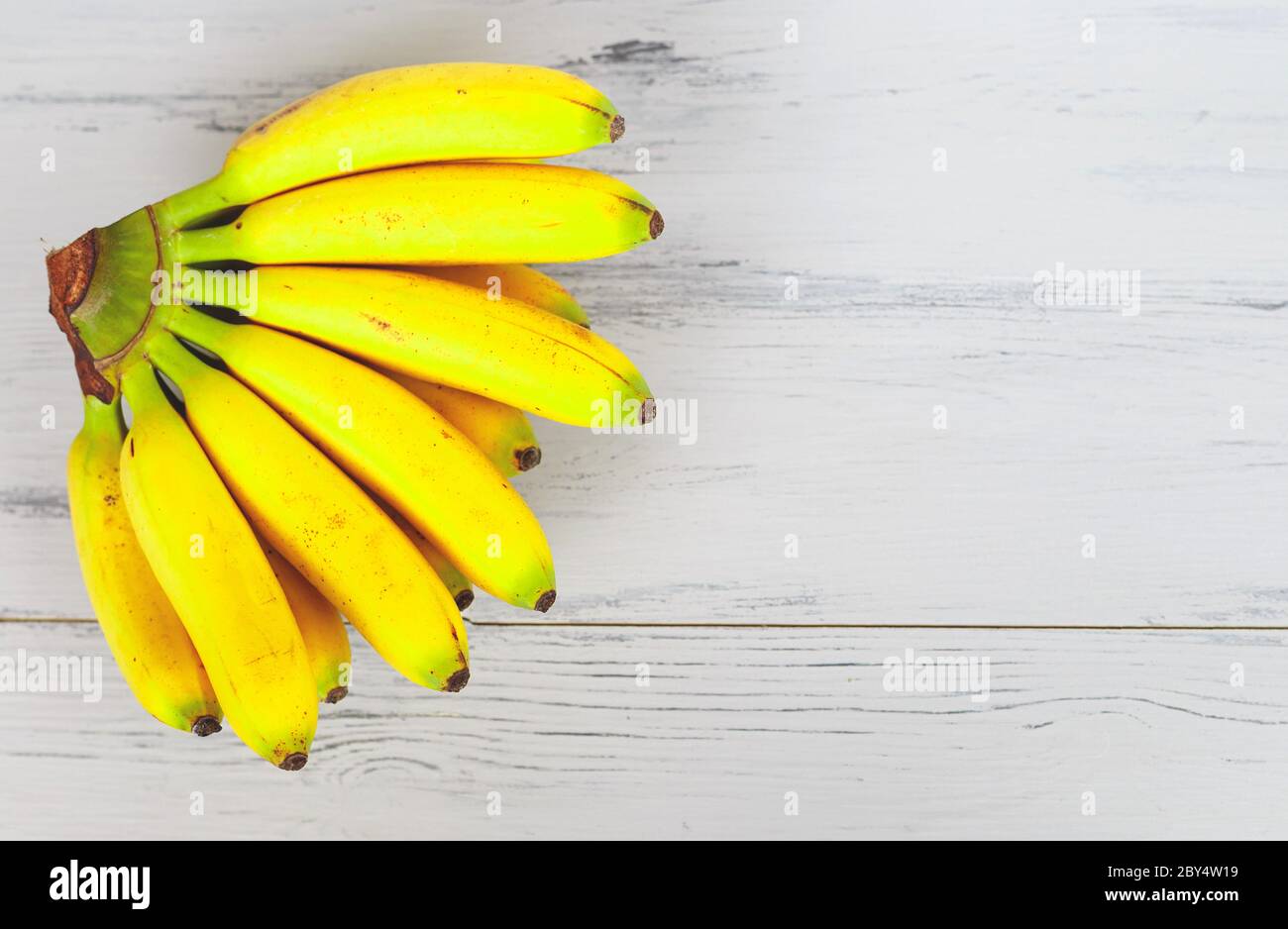 Bananas on gray wooden hi-res stock photography and images - Alamy