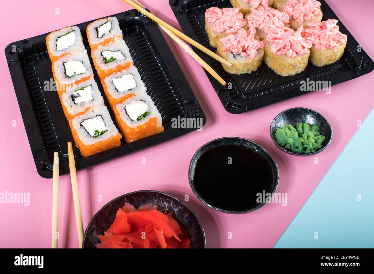 Philadelphia and lava rolls served in plastic boxes. Restaurant healthy ...