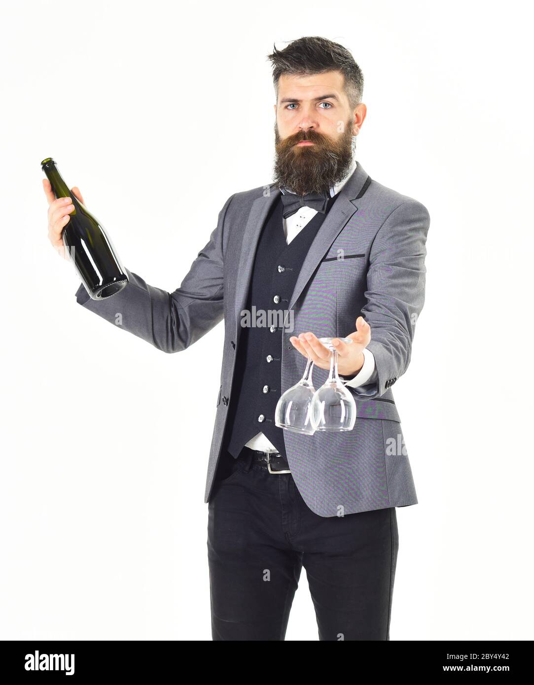 Sommelier with wine concept. Sommelier wears formal suit and bow tie ...