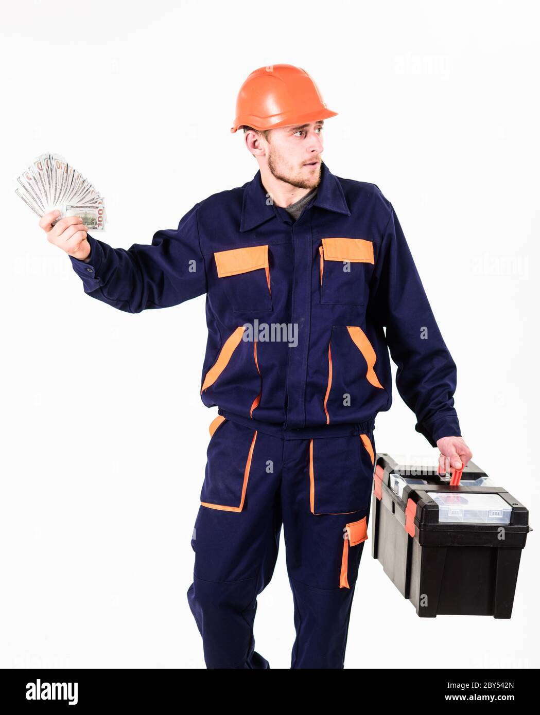 Payday concept. Man with toolbox got salary, money for work. Mechanic ...