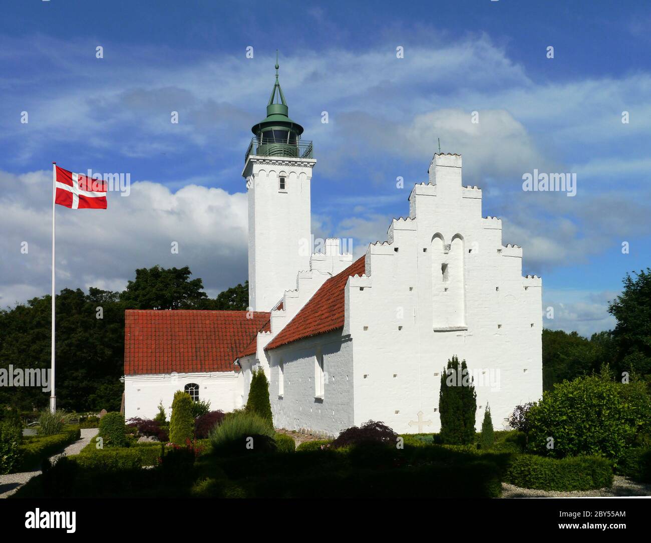 Church and Lighthouse in Denmark Stock Photo - Alamy