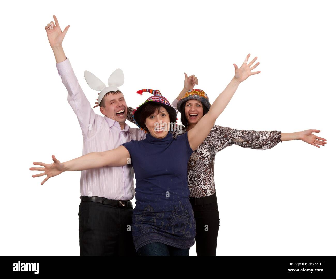 Three friends having fun in the caps Stock Photo - Alamy