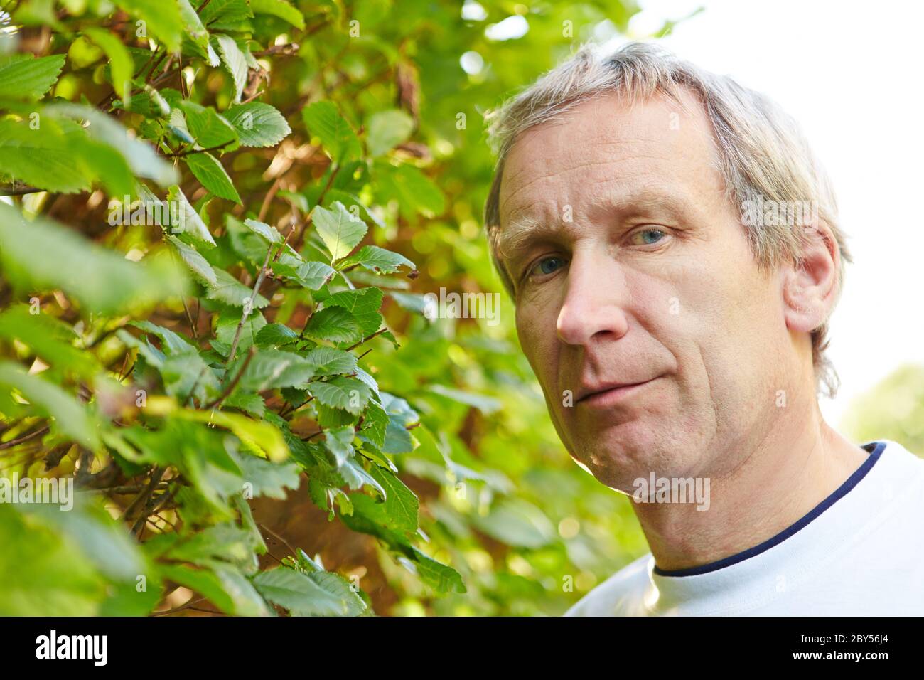 Old man stands hi-res stock photography and images - Alamy